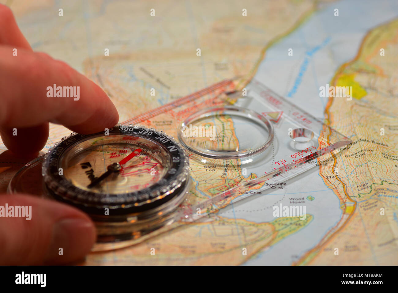 Map reading Compass and Ordinance Survey Map Stock Photo - Alamy