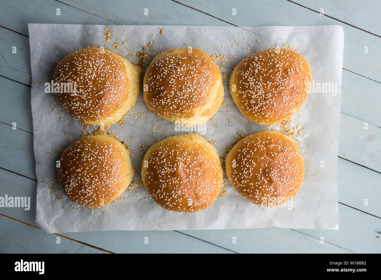 Homemade burger bun on parchment Stock Photo - Alamy