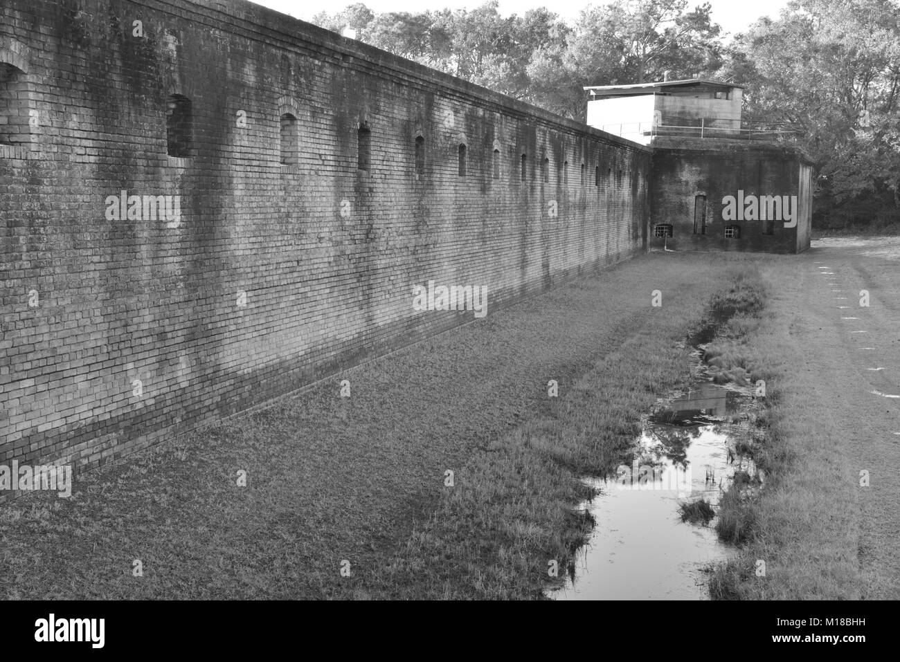 The outer walls with a moat of a fortress used in the American Civil ...