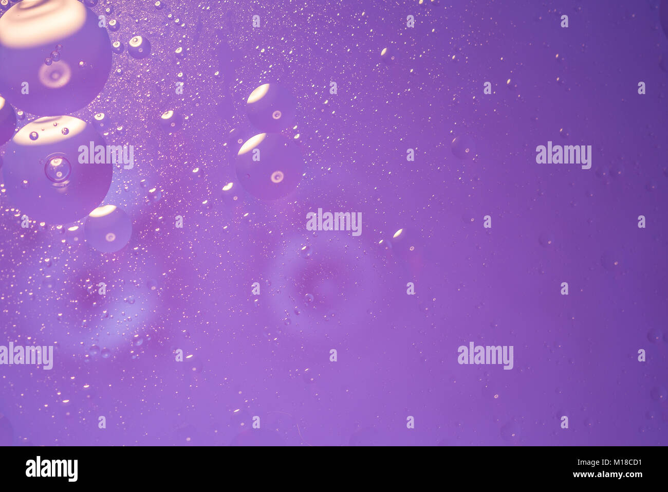 Purple oil bubble background image Stock Photo - Alamy