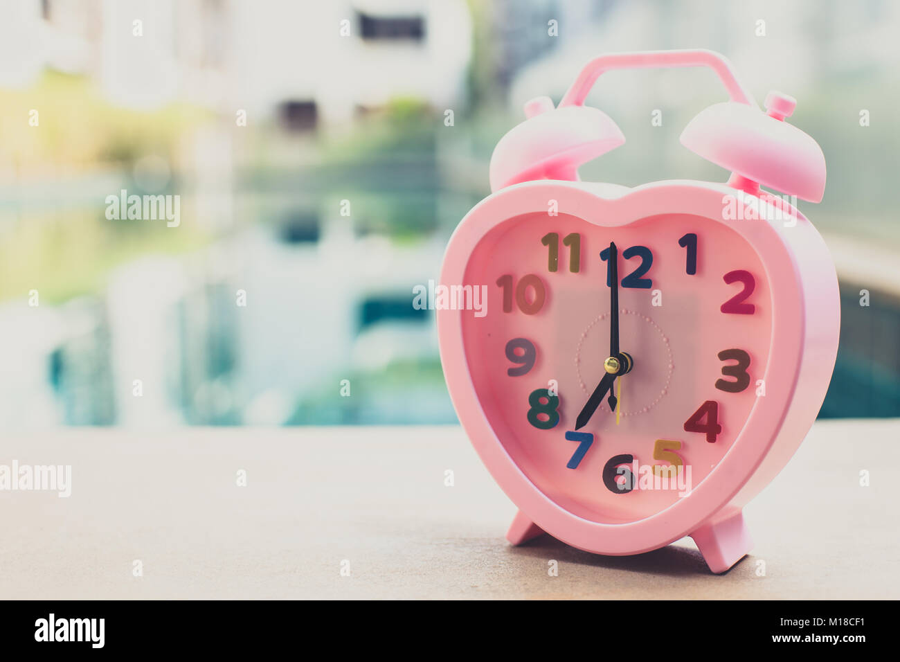 love pink heart clock color morning times outdoor pool blur background ...