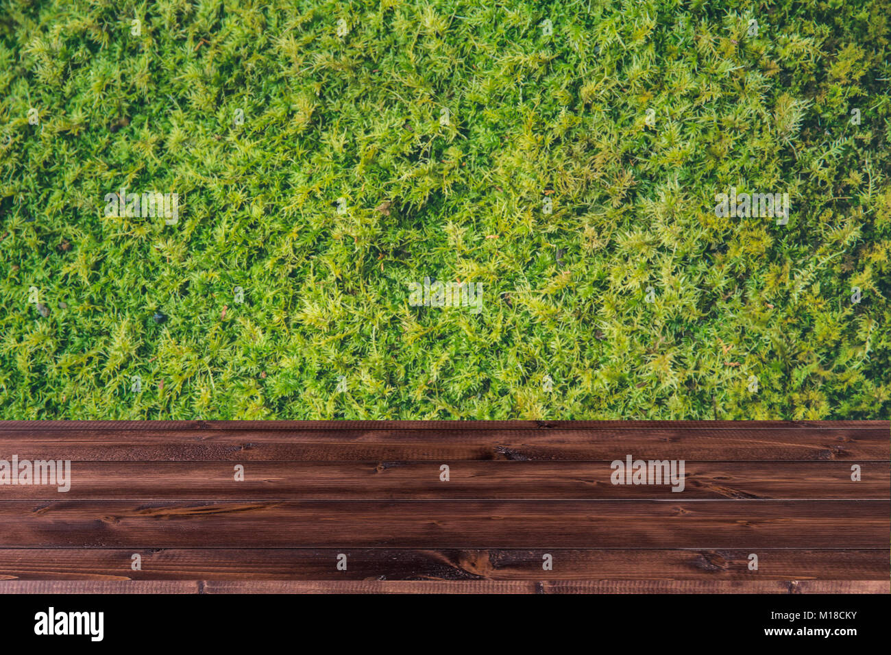 green grass with wood table desk for background Stock Photo - Alamy