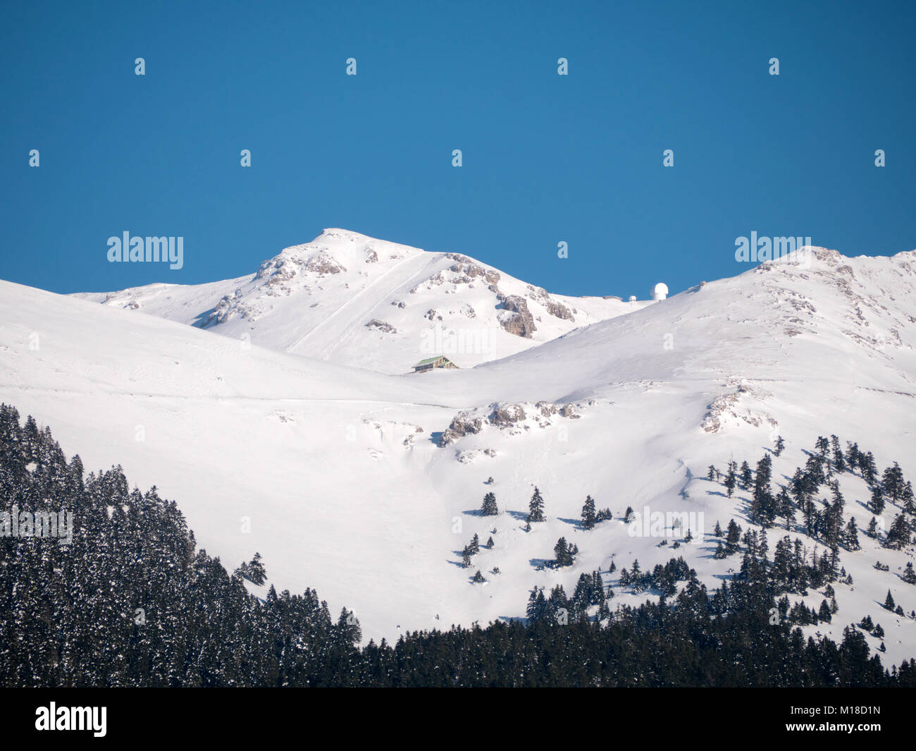 Landscape of Helmos mountain covered with snow in a sunny day,Kalavrita ...