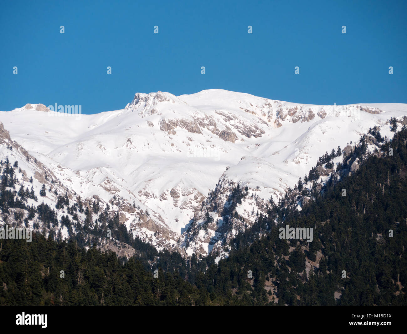 Landscape of Helmos mountain covered with snow in a sunny day,Kalavrita ...