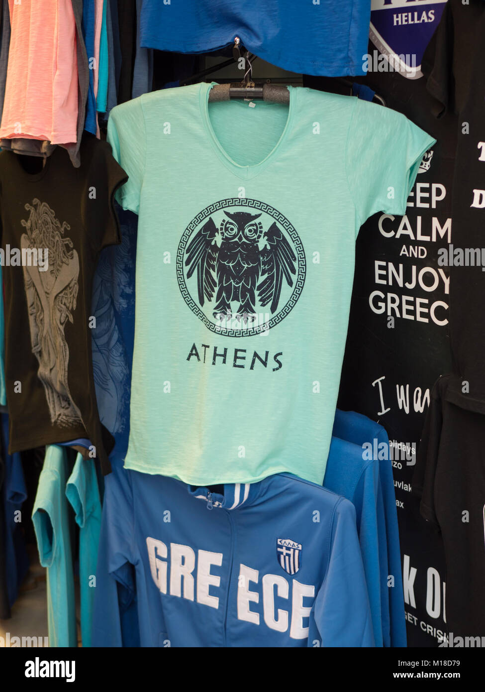ATHENS,GREECE-JANUARY 2, 2017: Clothes with Athens logo outside a store ...