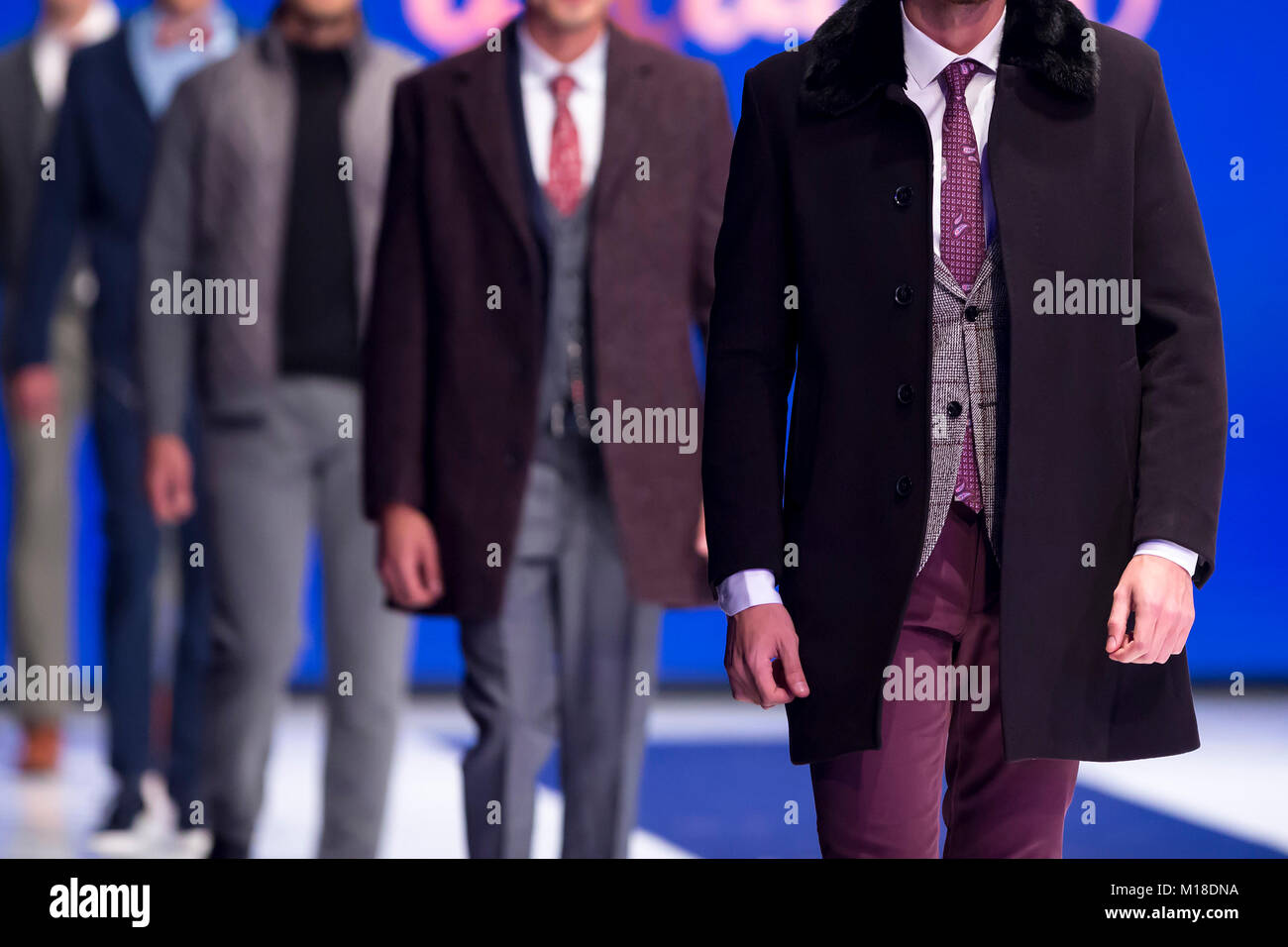 Male models walking hi-res stock photography and images - Alamy