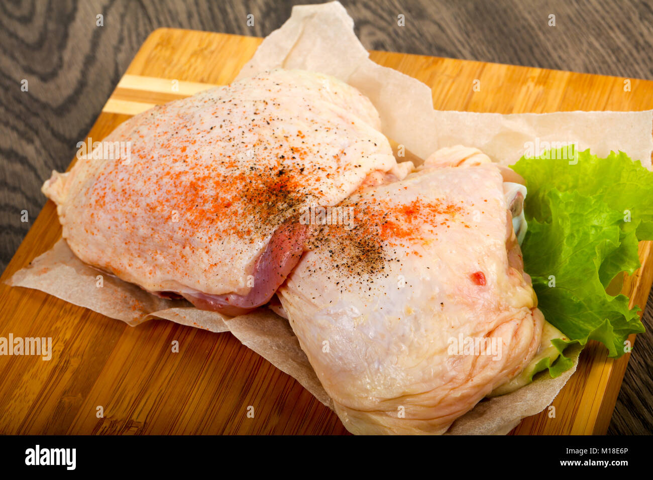Raw chicken thighs ready for cooking Stock Photo - Alamy