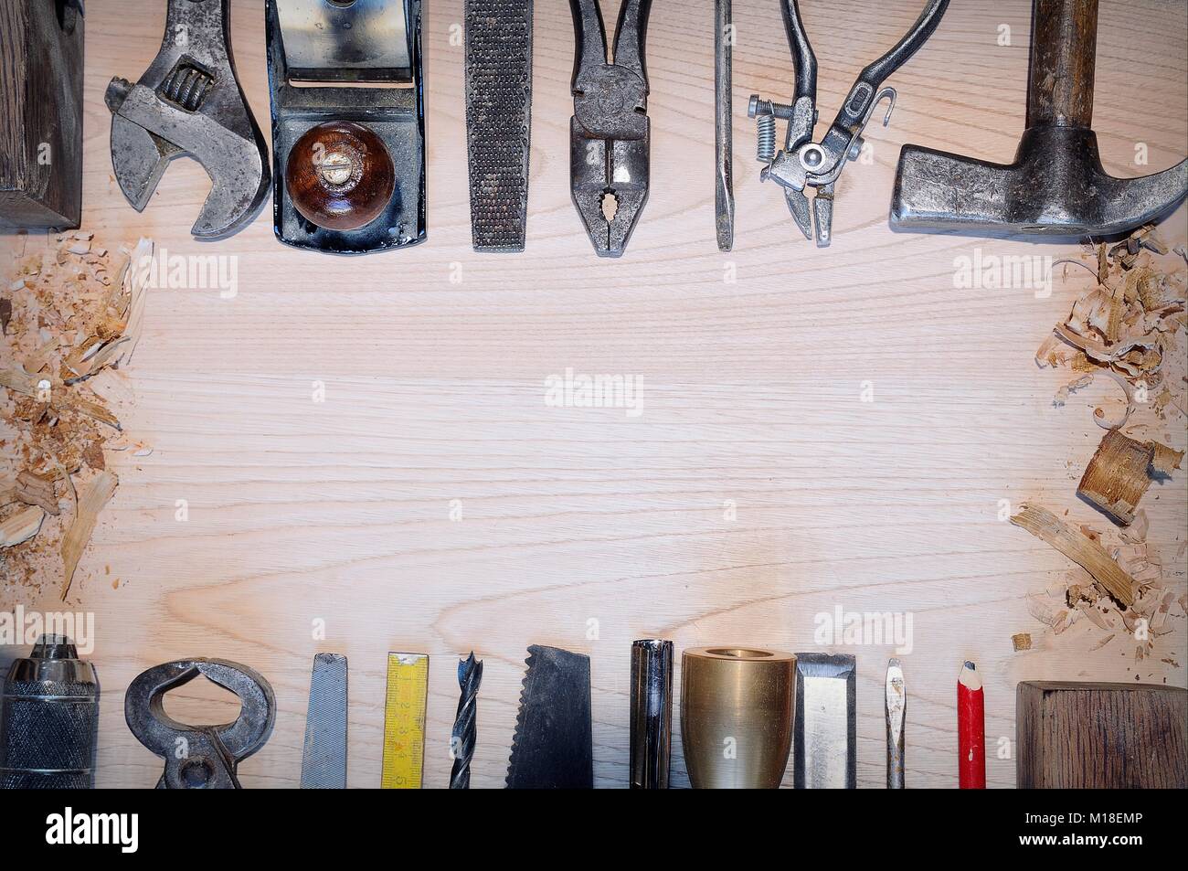 Different instruments around the perimeter on wooden background. Copy ...