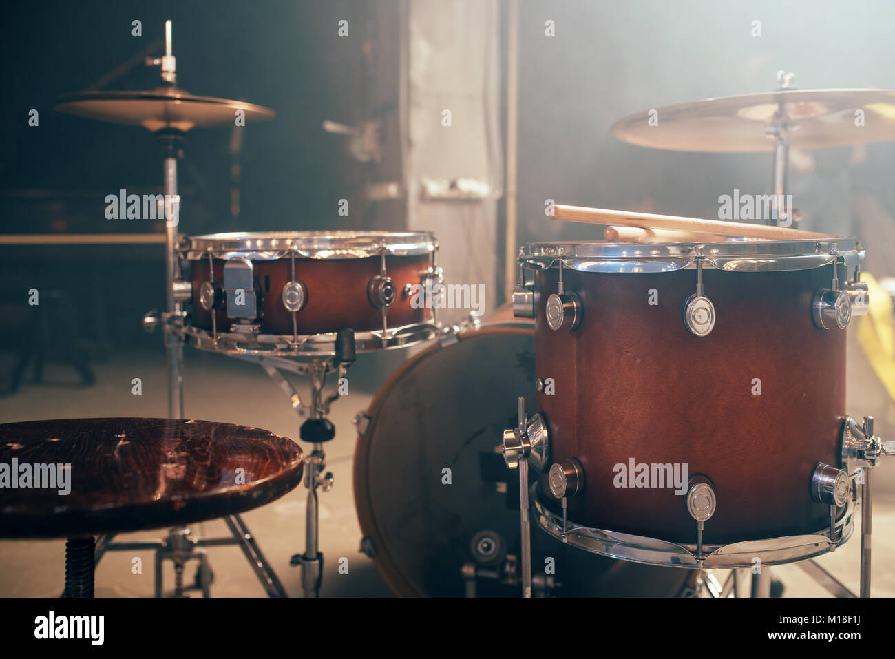 Drum-kit, drum-set, percussion instrument on the stage with lights ...