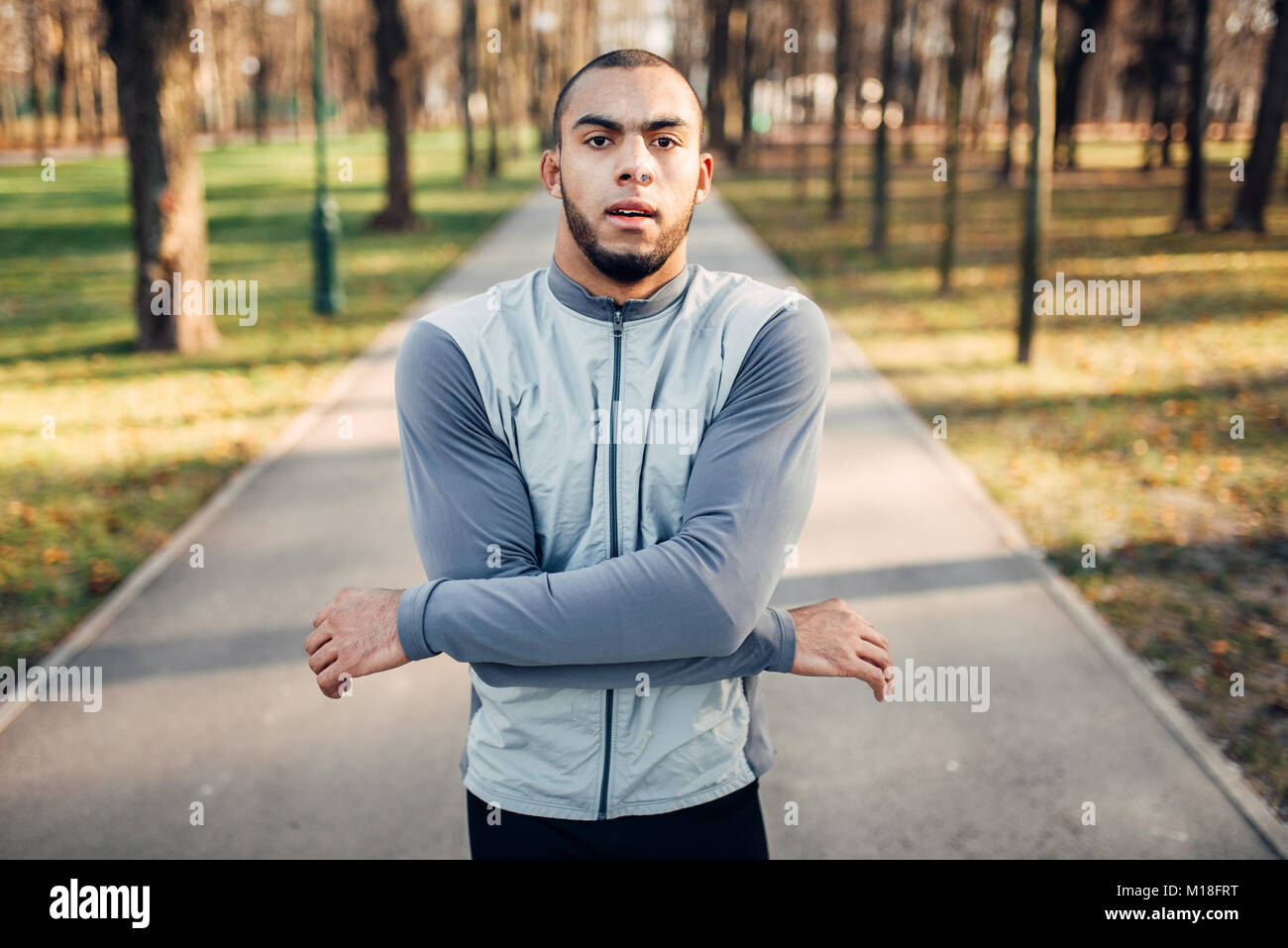 Runner marming up before marathon, active, healthy lifestyle. Athlete ...