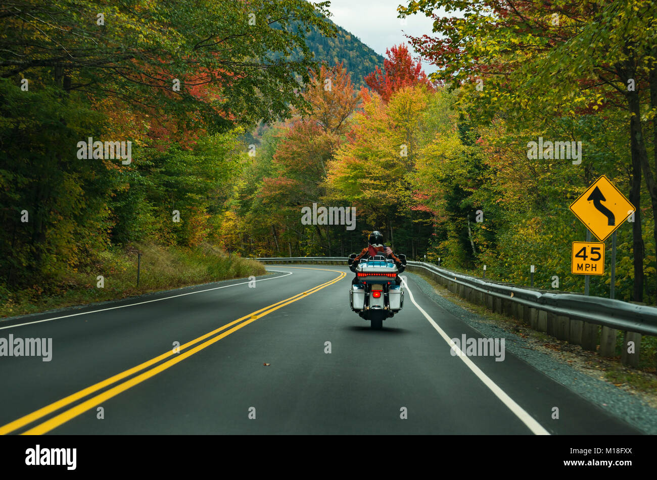 Motorcycle driving on the road on the White Mountains during the fall ...