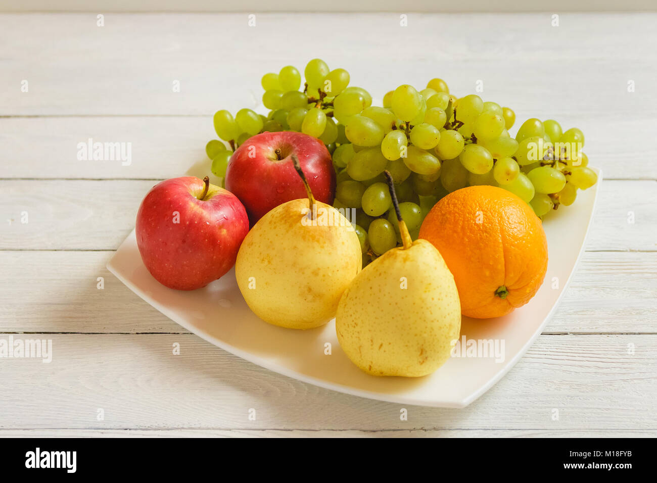 Healthy fruit mix on the kitchen table Stock Photo - Alamy