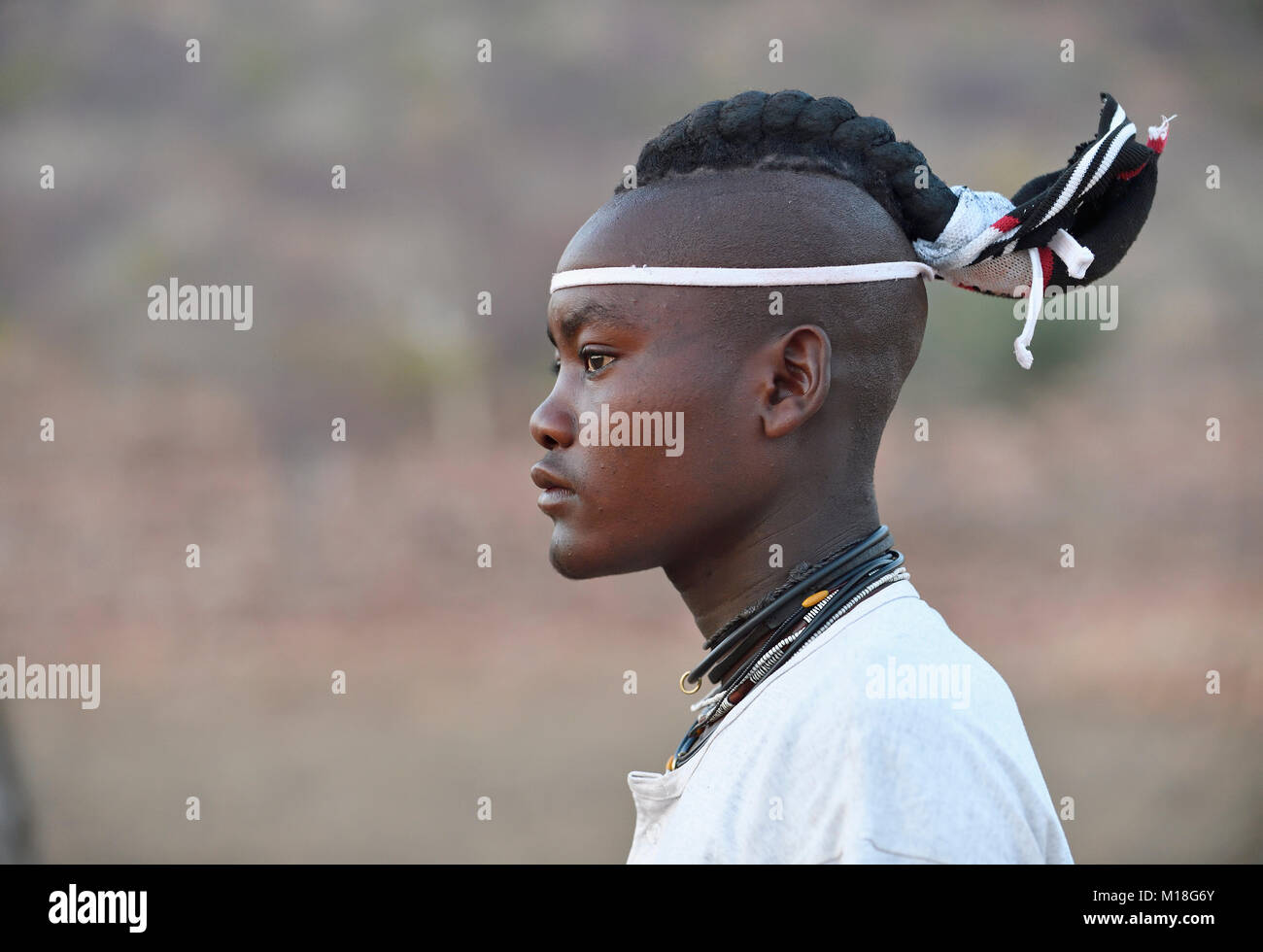 Young Himba man with traditional hairstyle,Portrait,Kaokoveld,Namibia ...