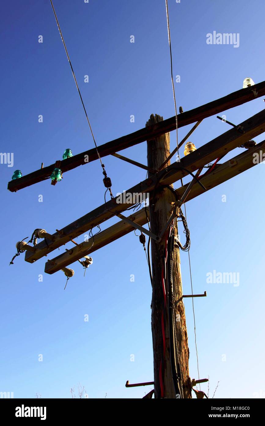 old wooden power poles with glass insulators Stock Photo - Alamy