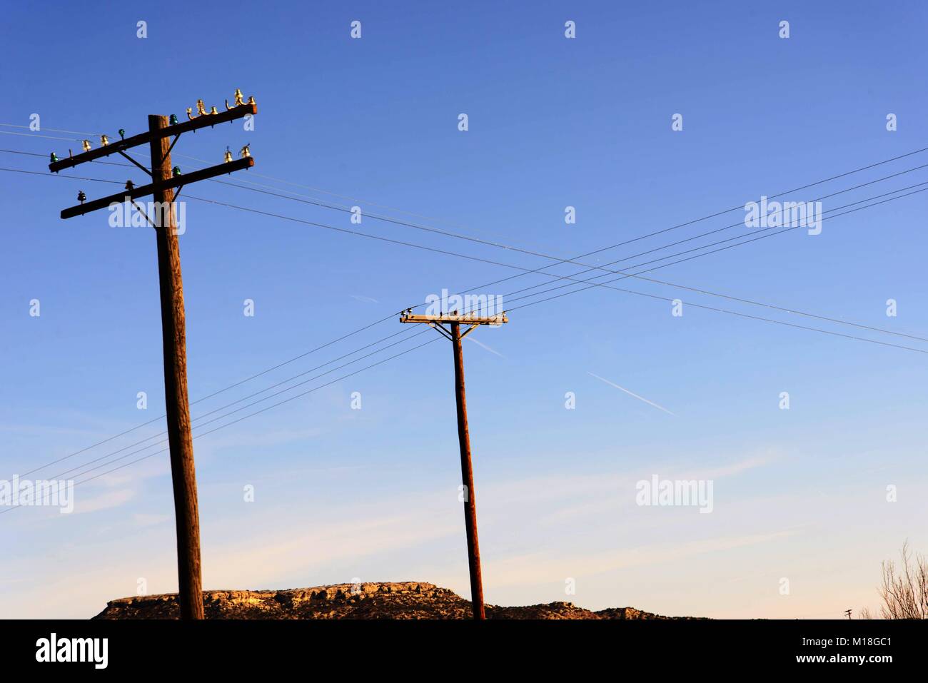 old wooden power poles with glass insulators Stock Photo - Alamy