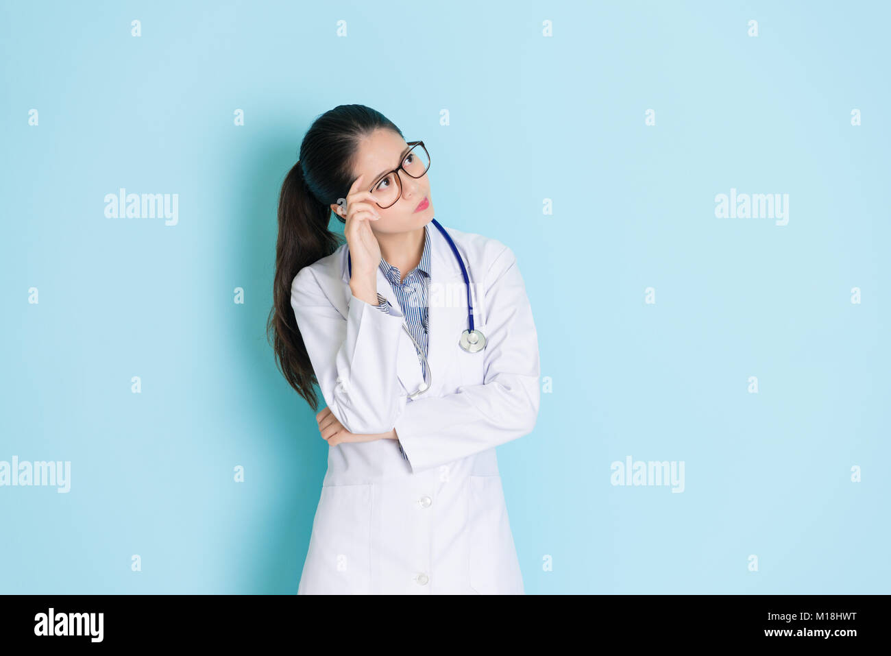 young beautiful lady doctor having medical problem feeling confused and ...