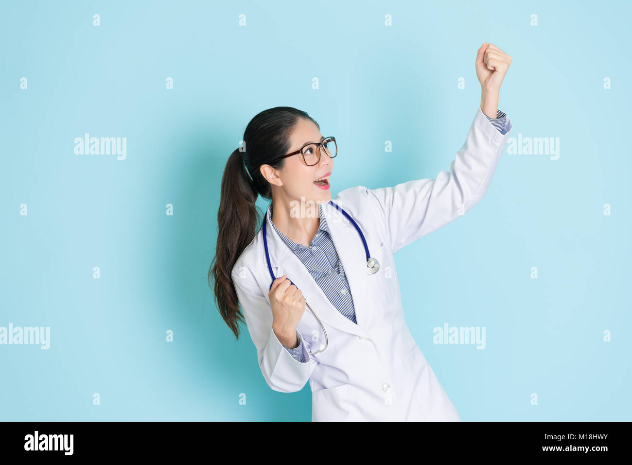 Standing in winner posture hi-res stock photography and images - Alamy