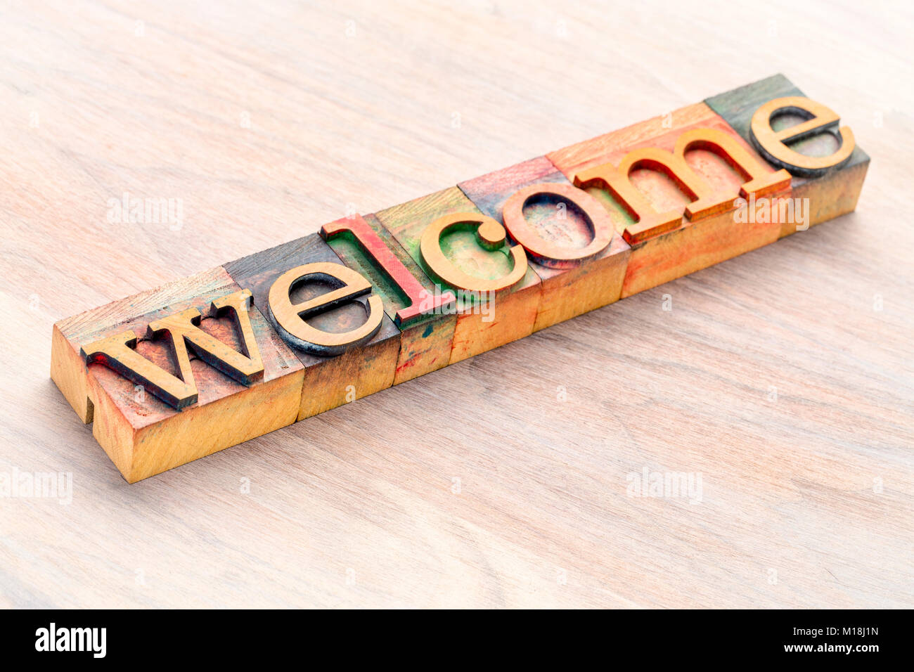 welcome word abstract in letterpress wood type printing blocks stained ...