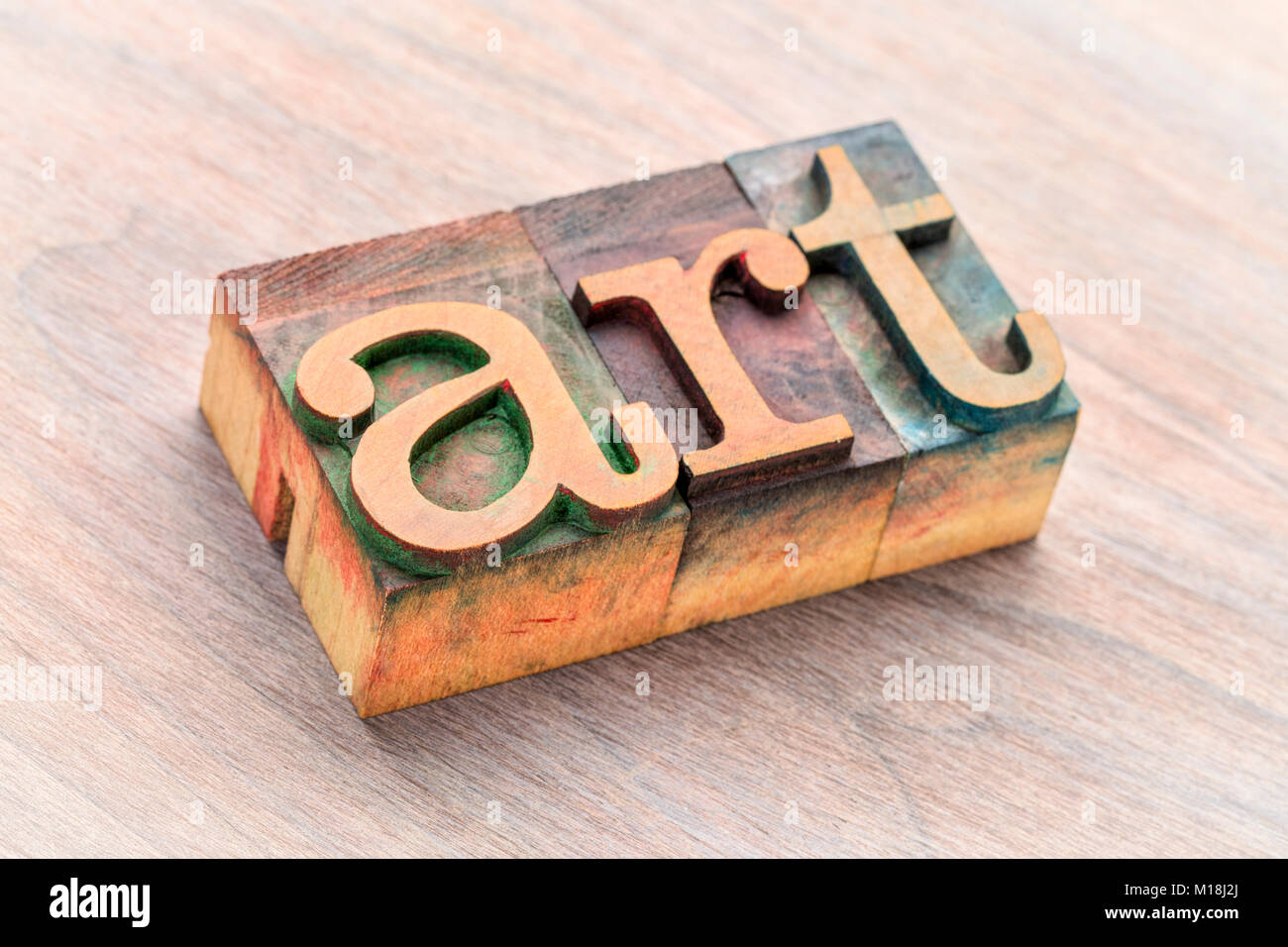 art word abstract in letterpress wood type blocks stained by color inks ...