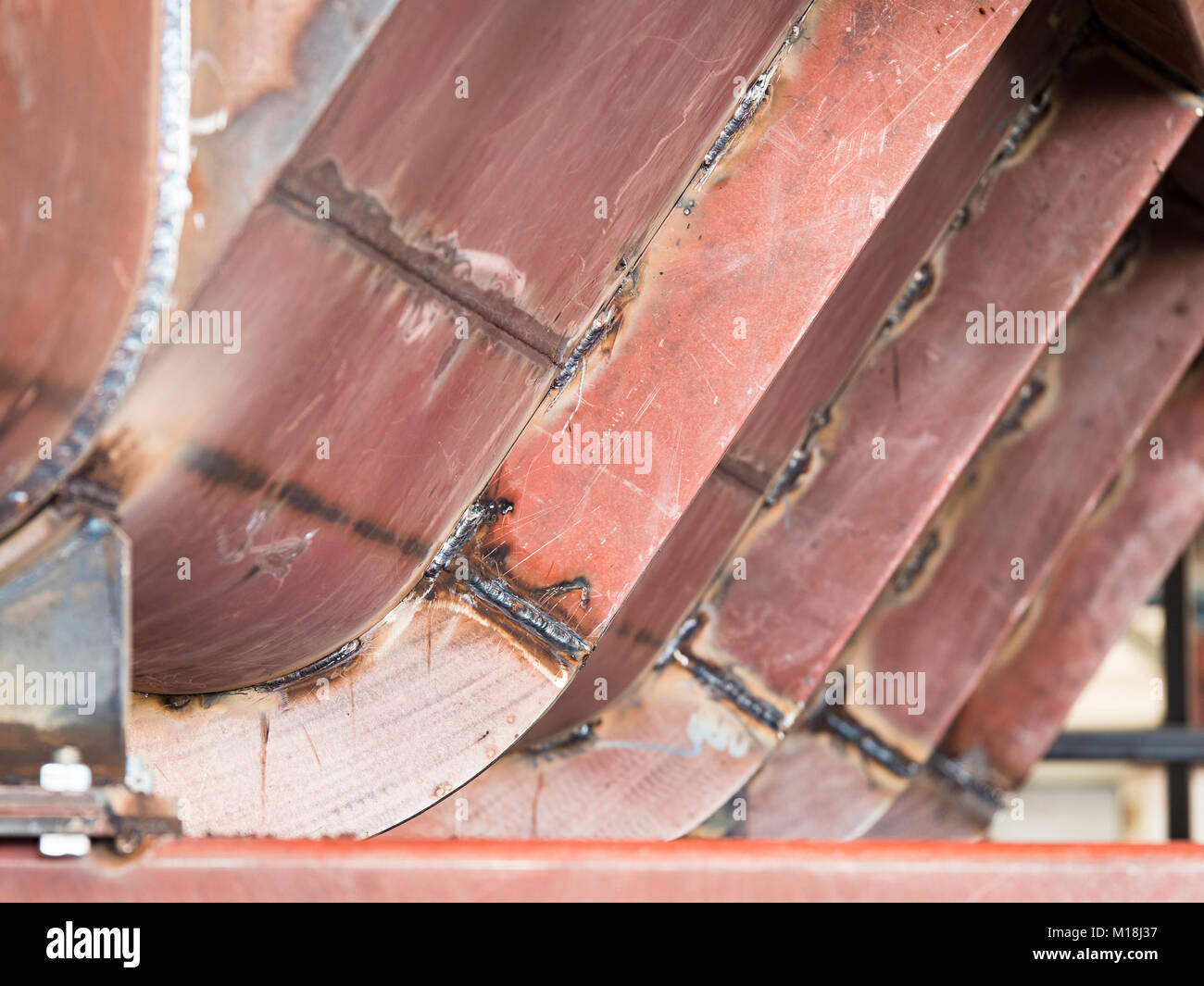 Large steel tank with welded on reinforcement beams under construction ...