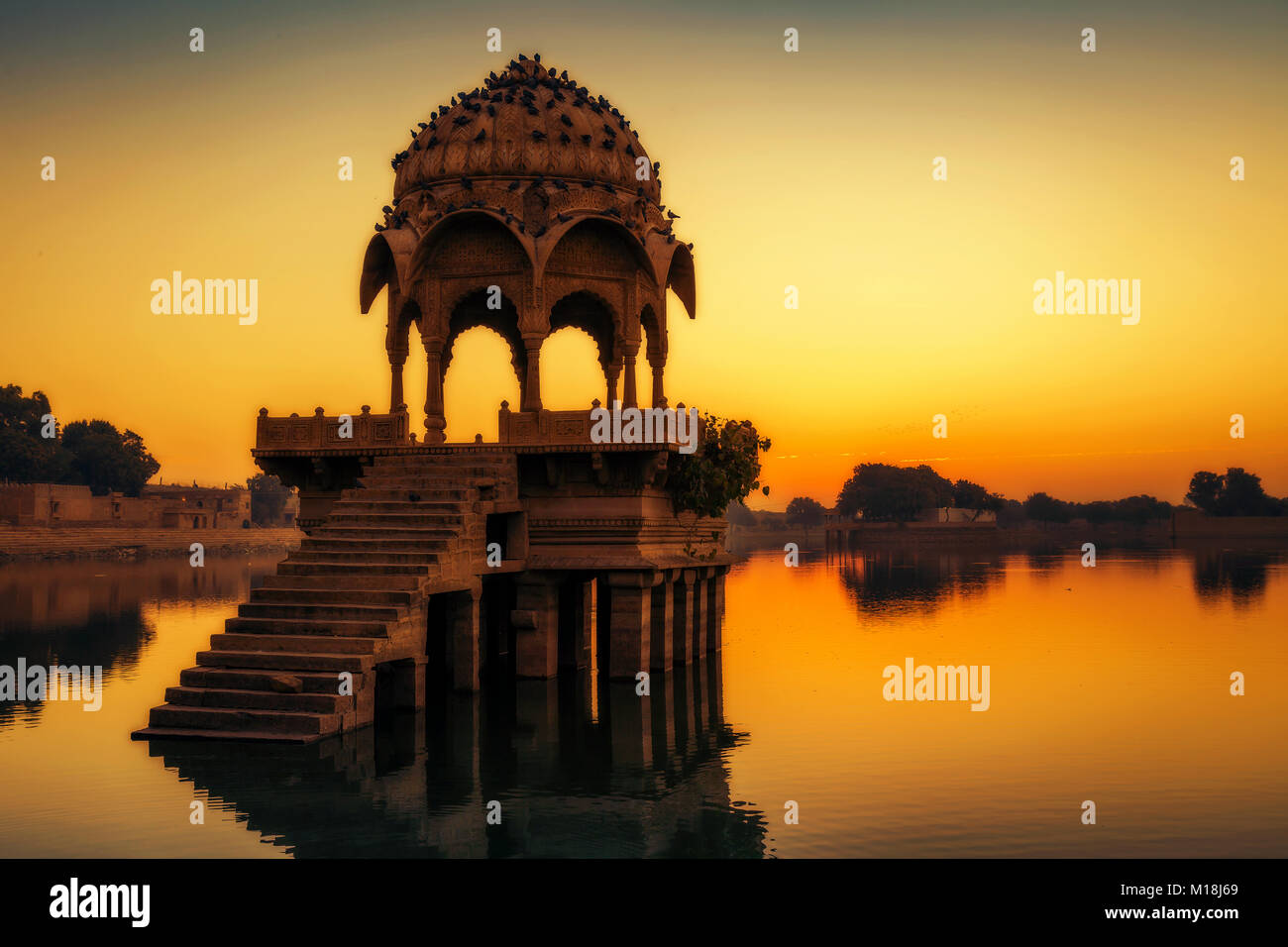 Gadi Sagar Lake (Gadisar) Jaisalmer Rajasthan with ancient architecture ...