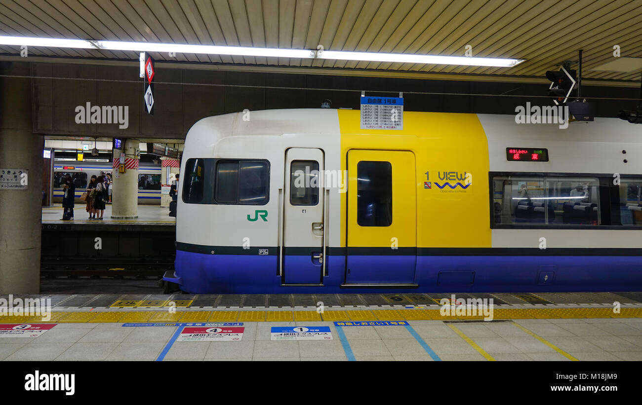 Tokyo, Japan - Sep 29, 2017. A JR train stopping at metro station in ...