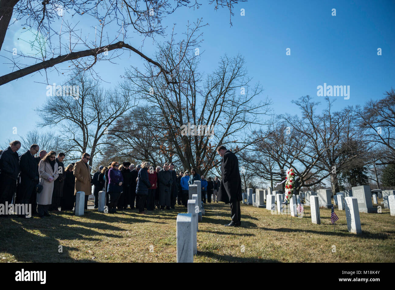 NASA employees, families and friends and Robert Lightfoot (right ...