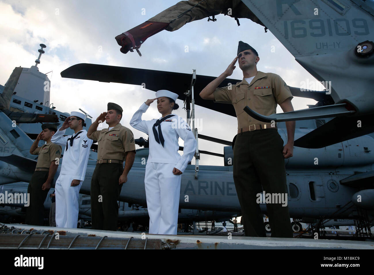 PEARL HARBOR (Jan. 24, 2018) – Marines and Sailors salute to the USS ...