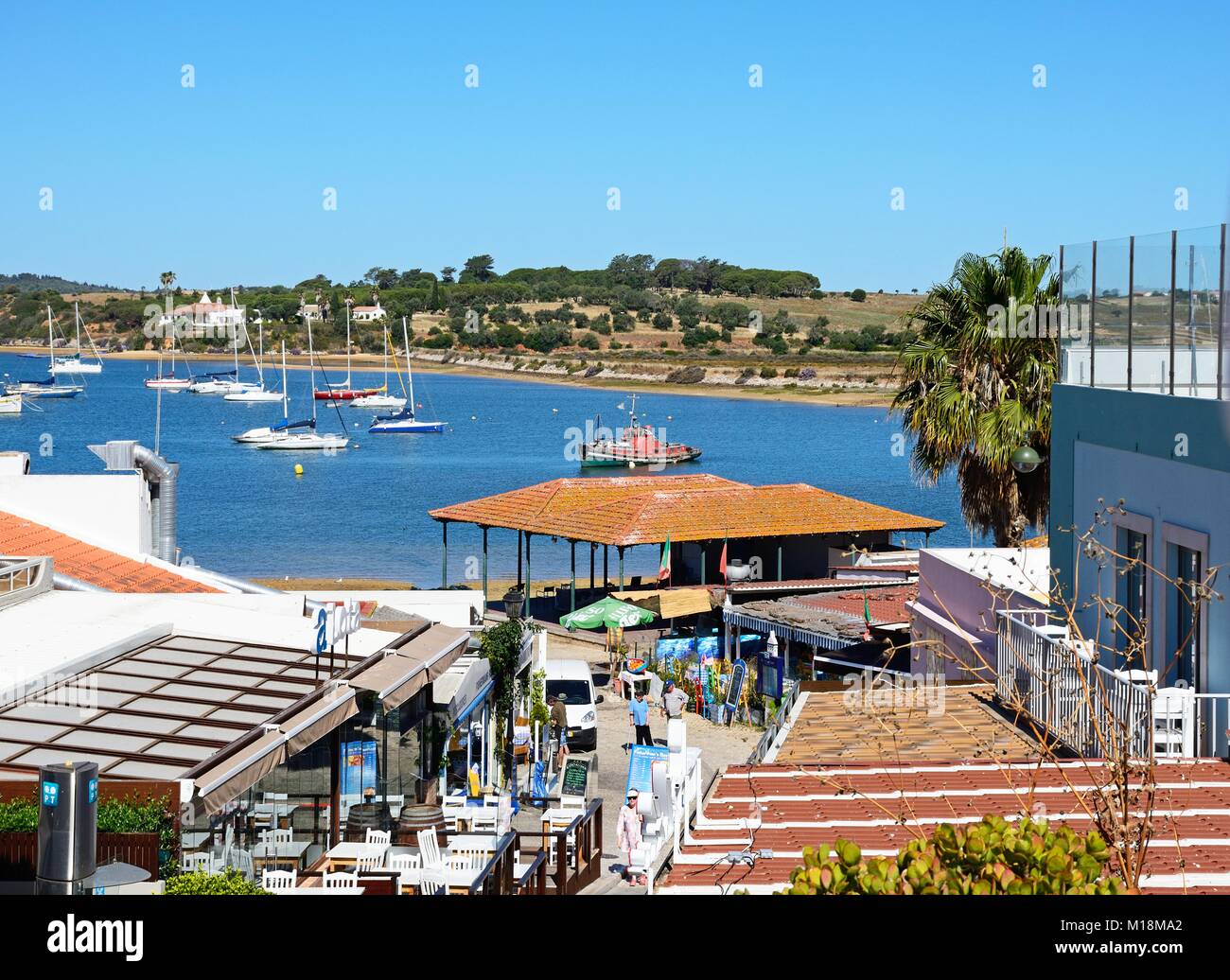 Restaurant lined street with views towards the fish market and estuary ...