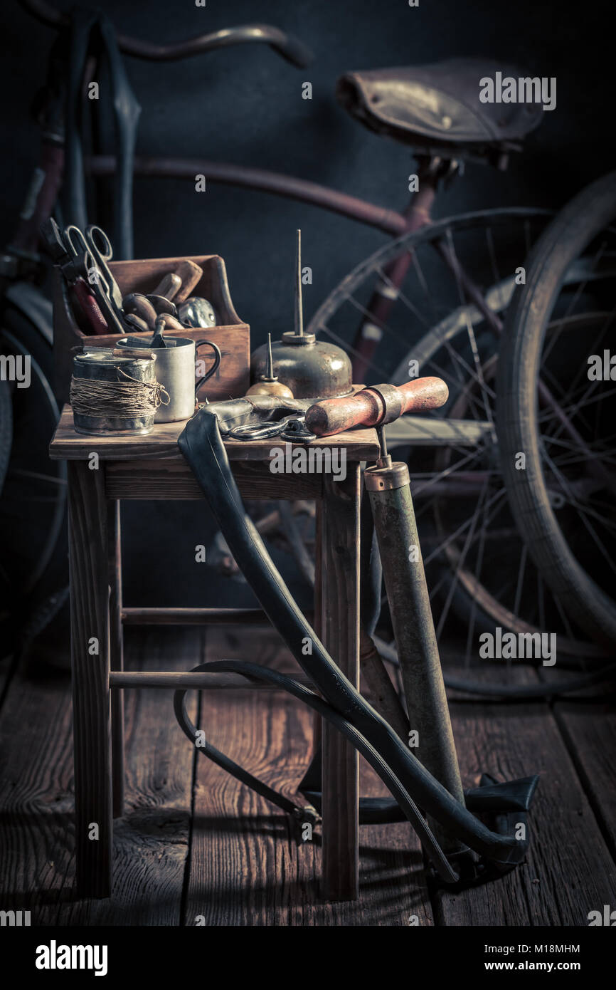 Old bike fix service with tools, wheels and tube Stock Photo - Alamy