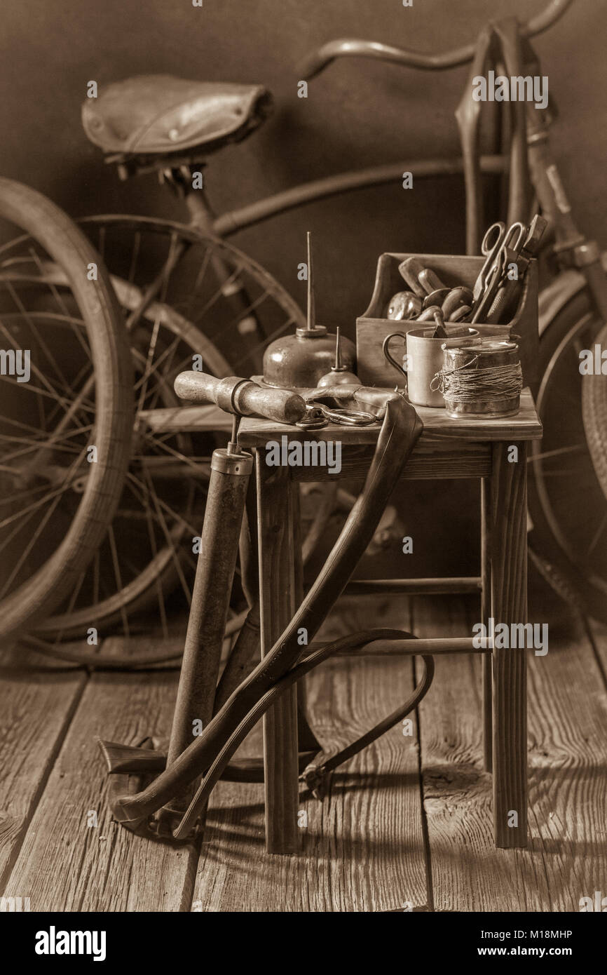Bicycle repair workshop with tools, wheels and tube Stock Photo - Alamy