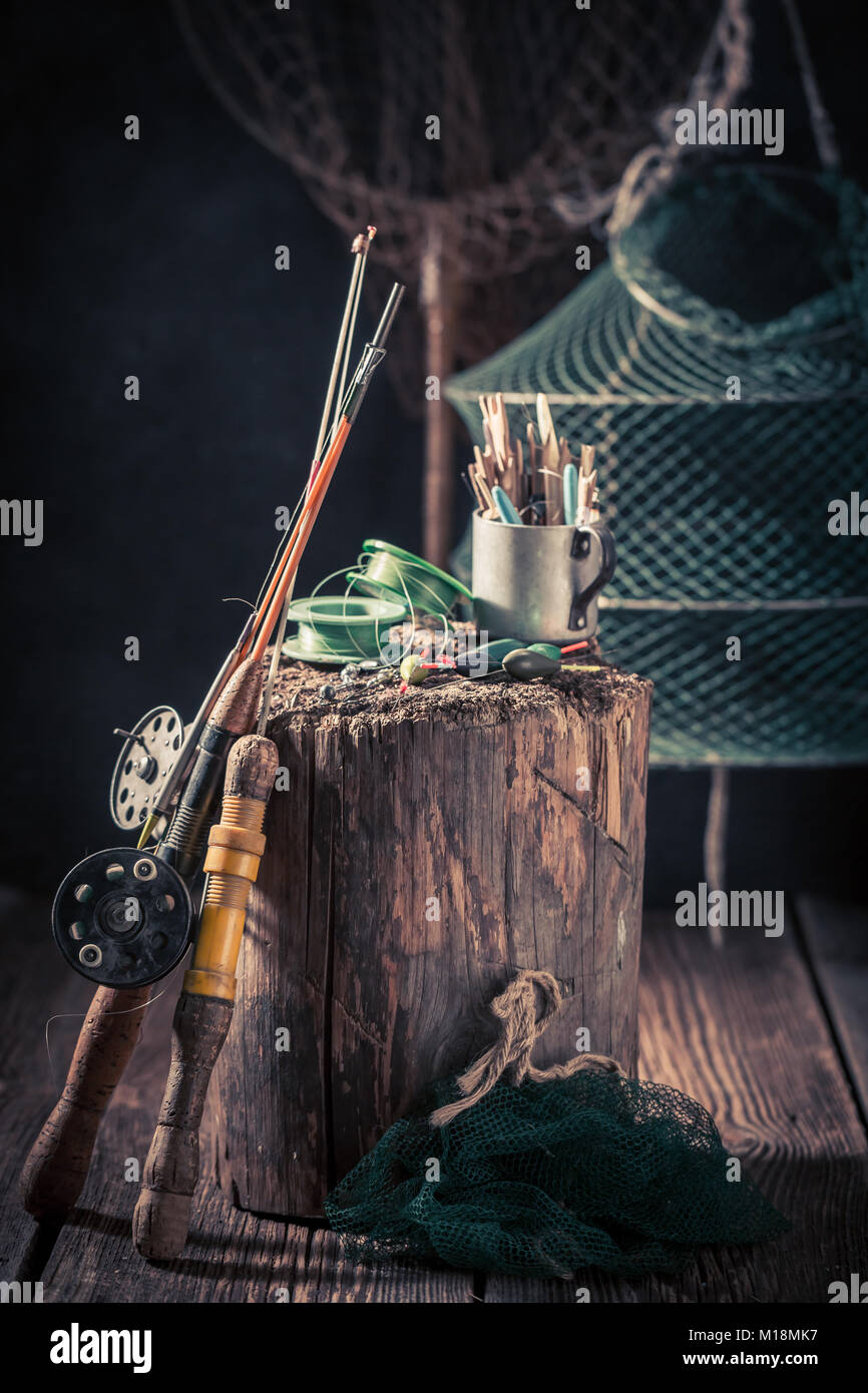 Old angler equipment with floats, hooks and rods Stock Photo - Alamy