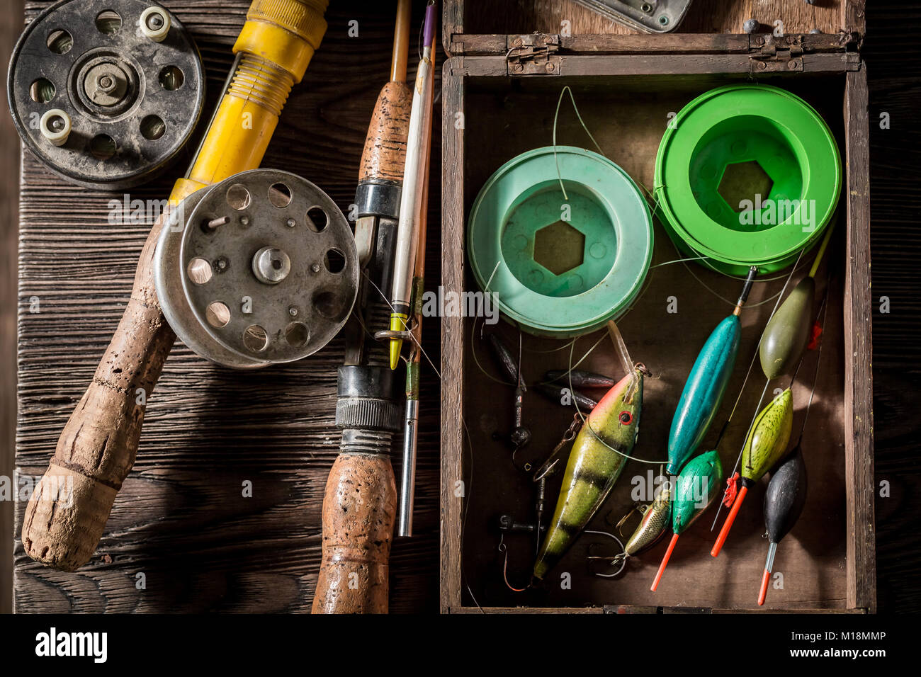 Handmade fishing tackle with fishing rod and lures Stock Photo - Alamy