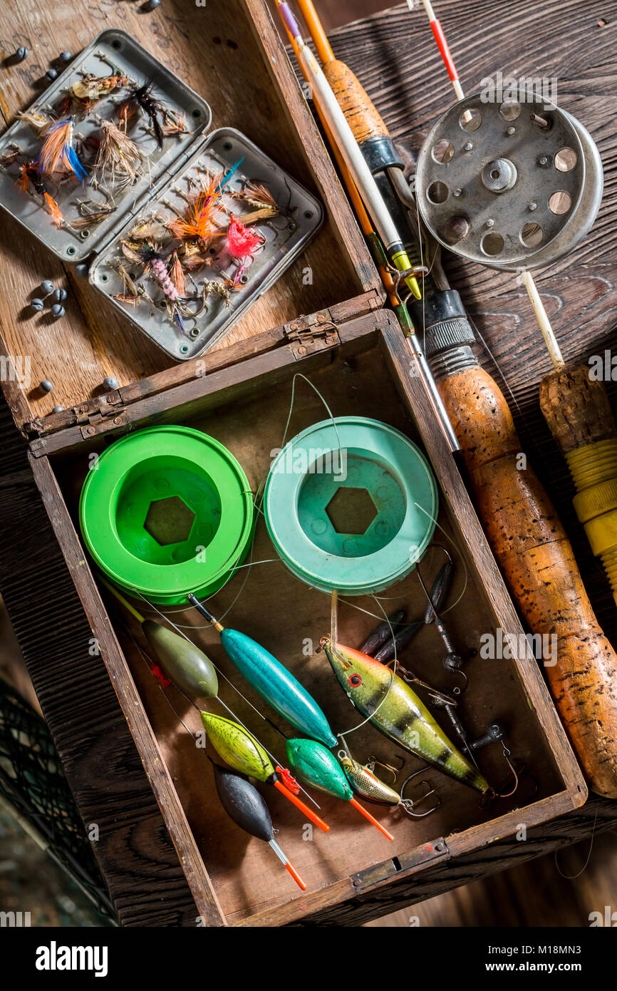 Old fishing tackle with floats, hooks and rods Stock Photo - Alamy