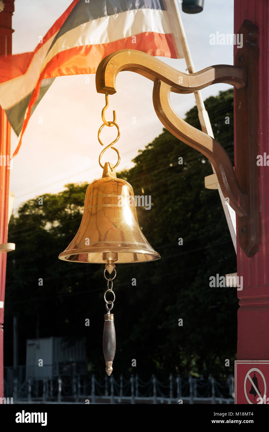 Bell hanging for a hitting signal for train at the railway station ...