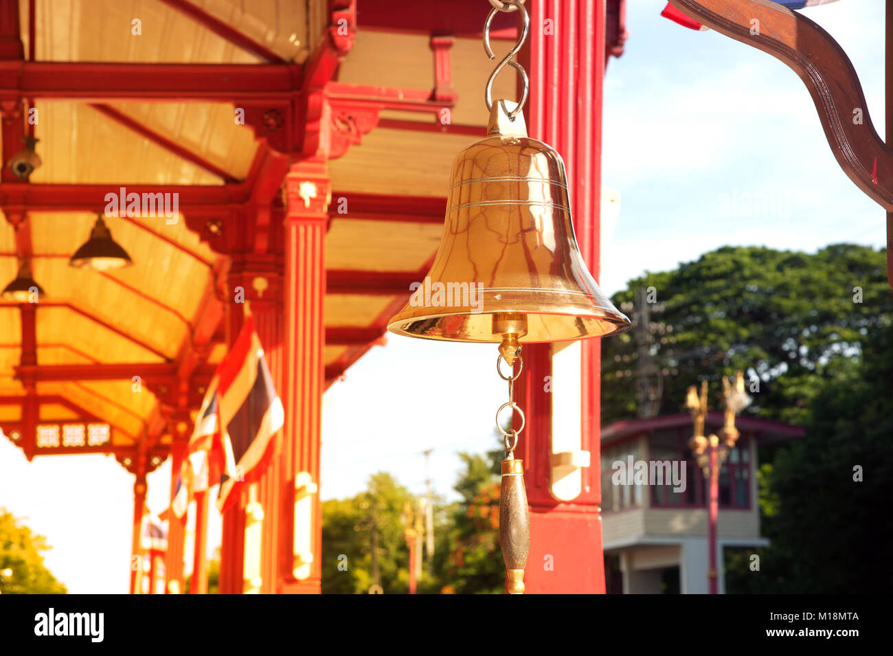 Bell hanging for a hitting signal for train at the railway station ...