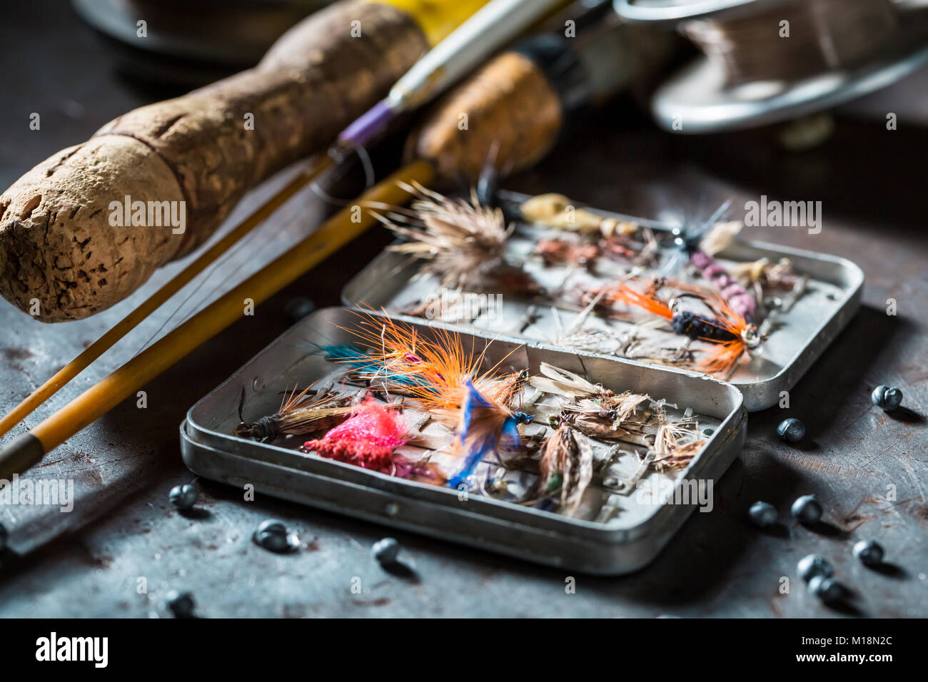 Old angler equipment with fishing rod and lures Stock Photo - Alamy