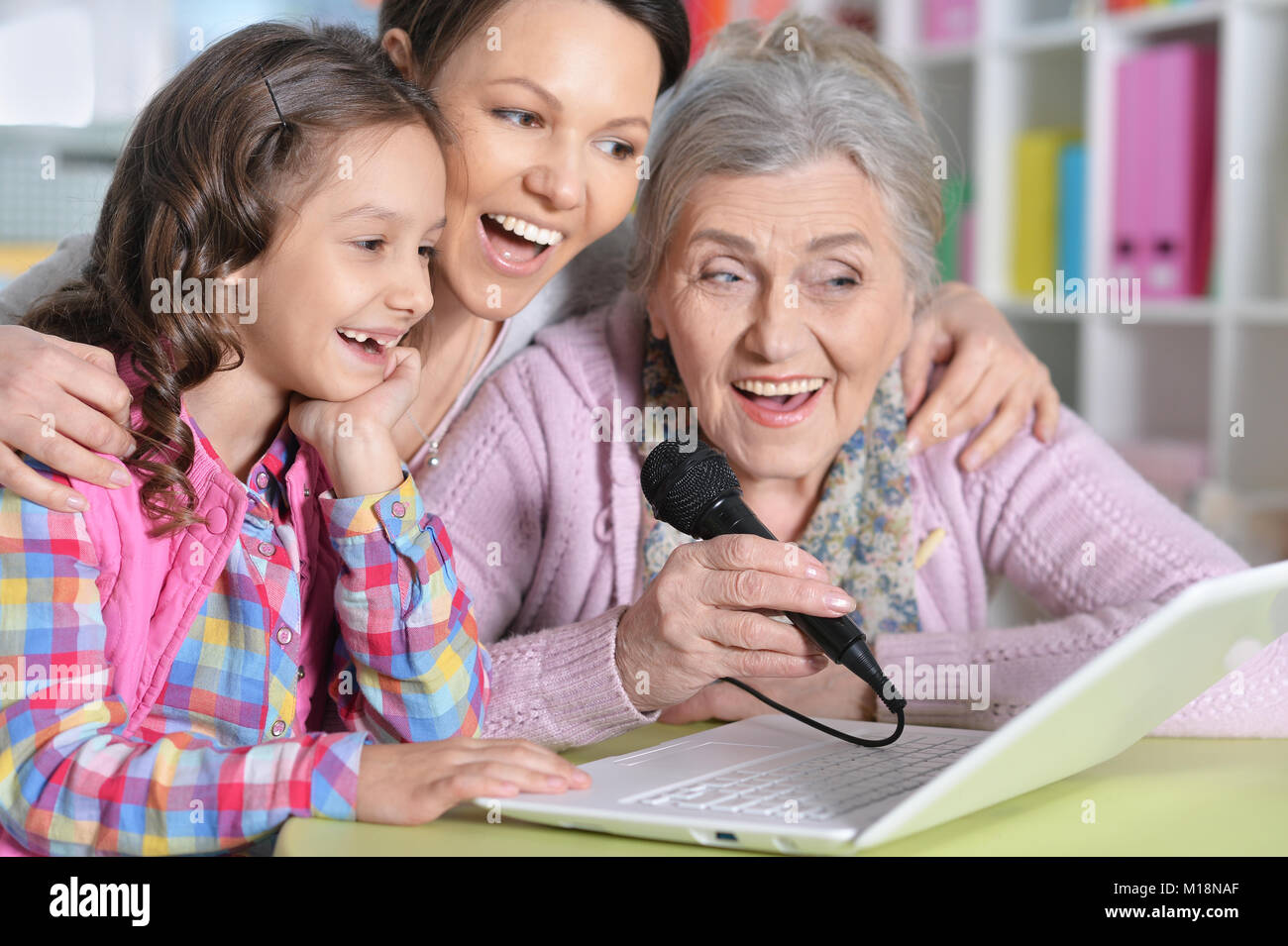 Mother singing baby hi-res stock photography and images - Alamy