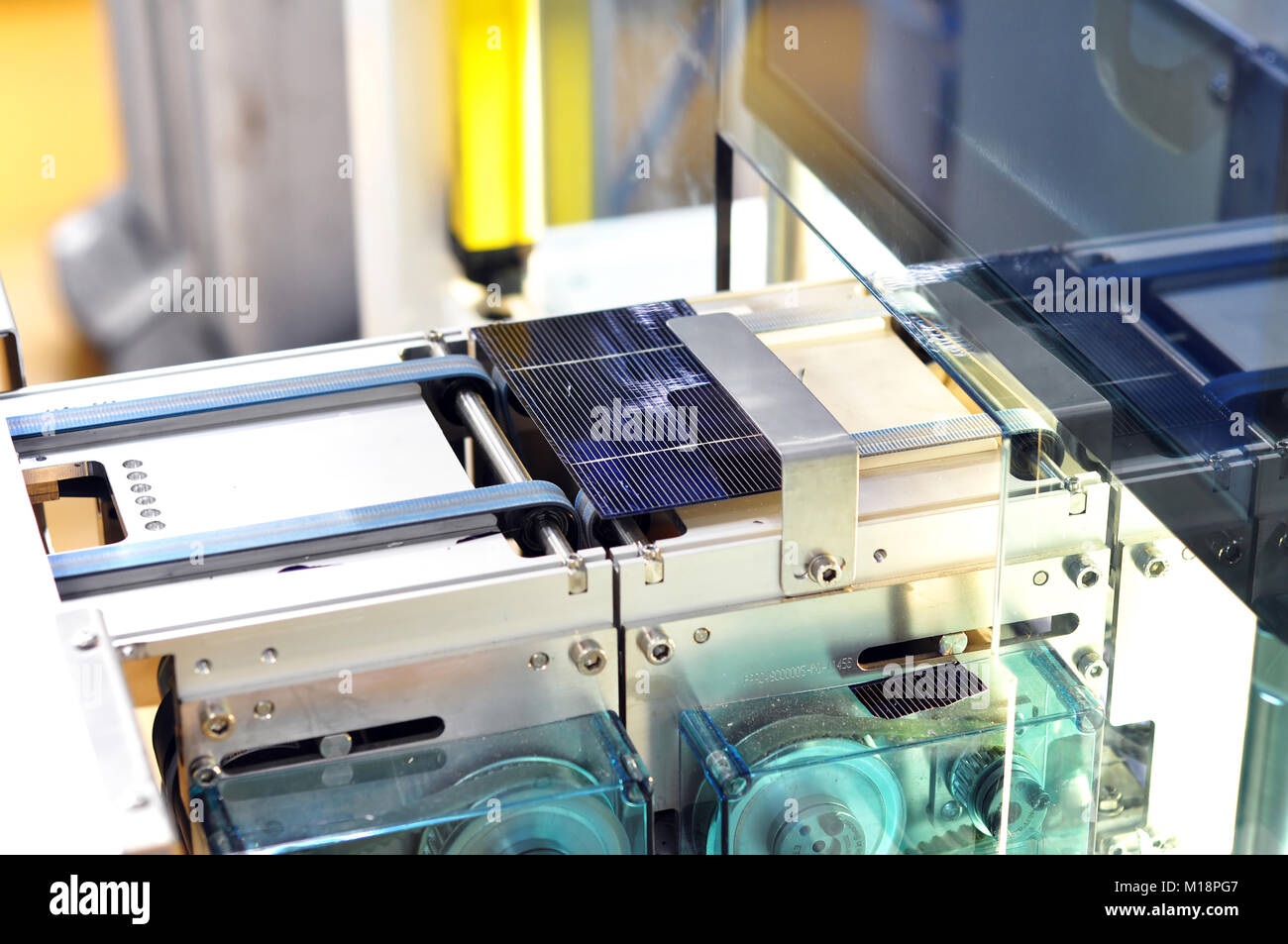 production of solar cells - conveyor belt in production with wafer ...