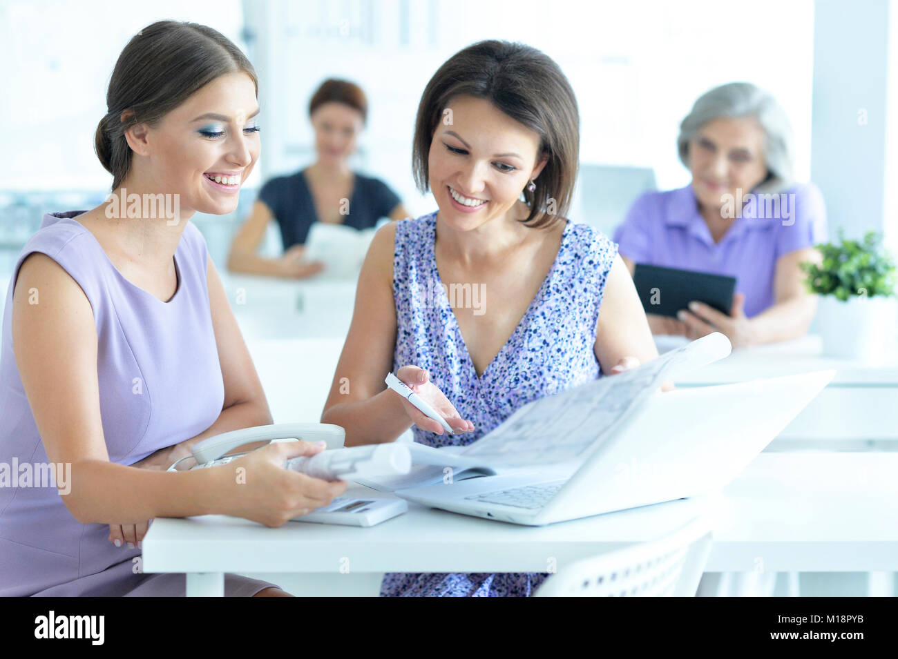 business women working in office Stock Photo - Alamy