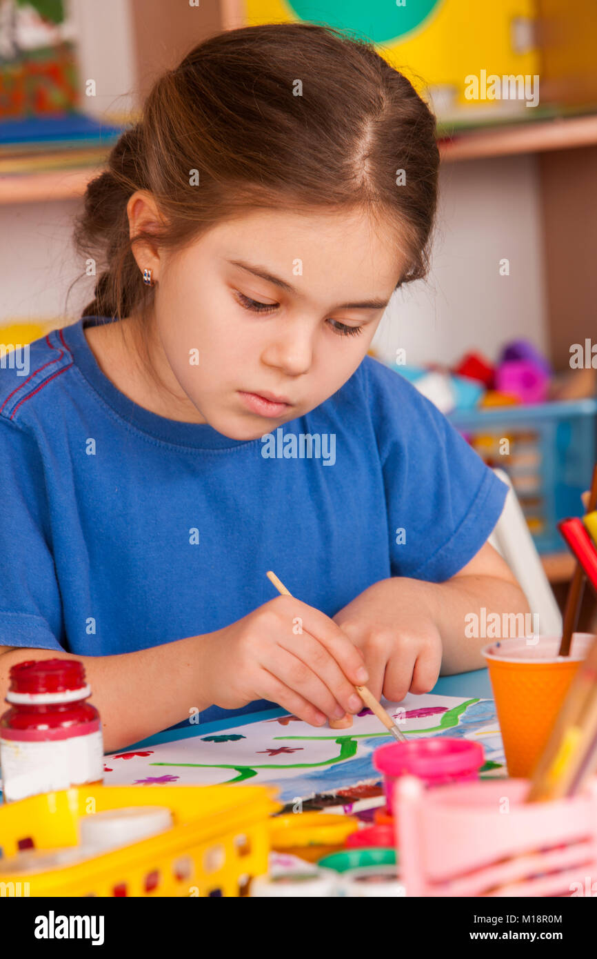 Small students children painting in art school class Stock Photo - Alamy