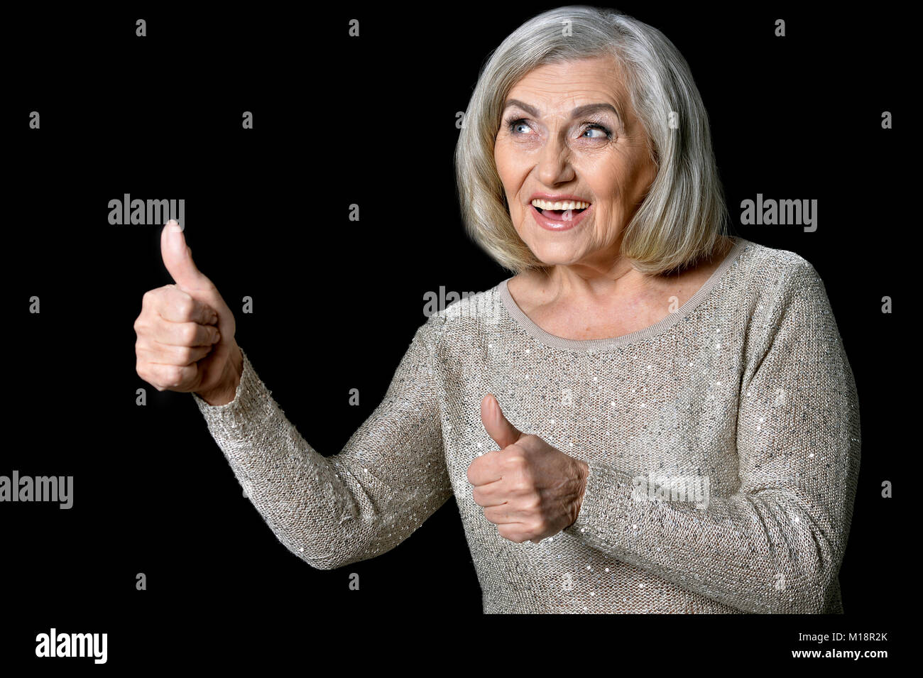 Old lady showing thumbs up hi-res stock photography and images - Alamy