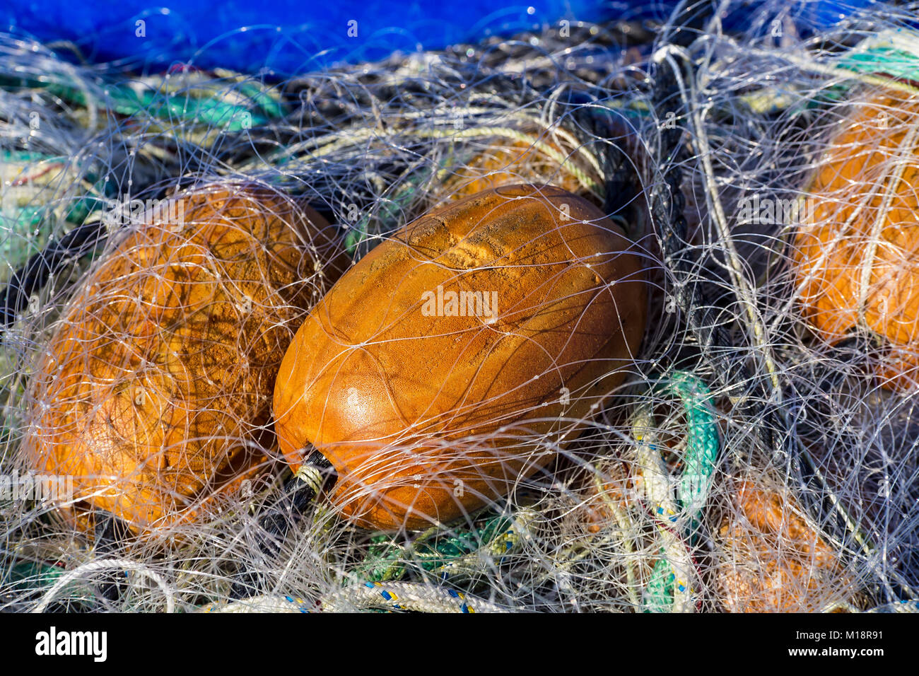 Detail of a traditional fishing net outdoors Stock Photo - Alamy