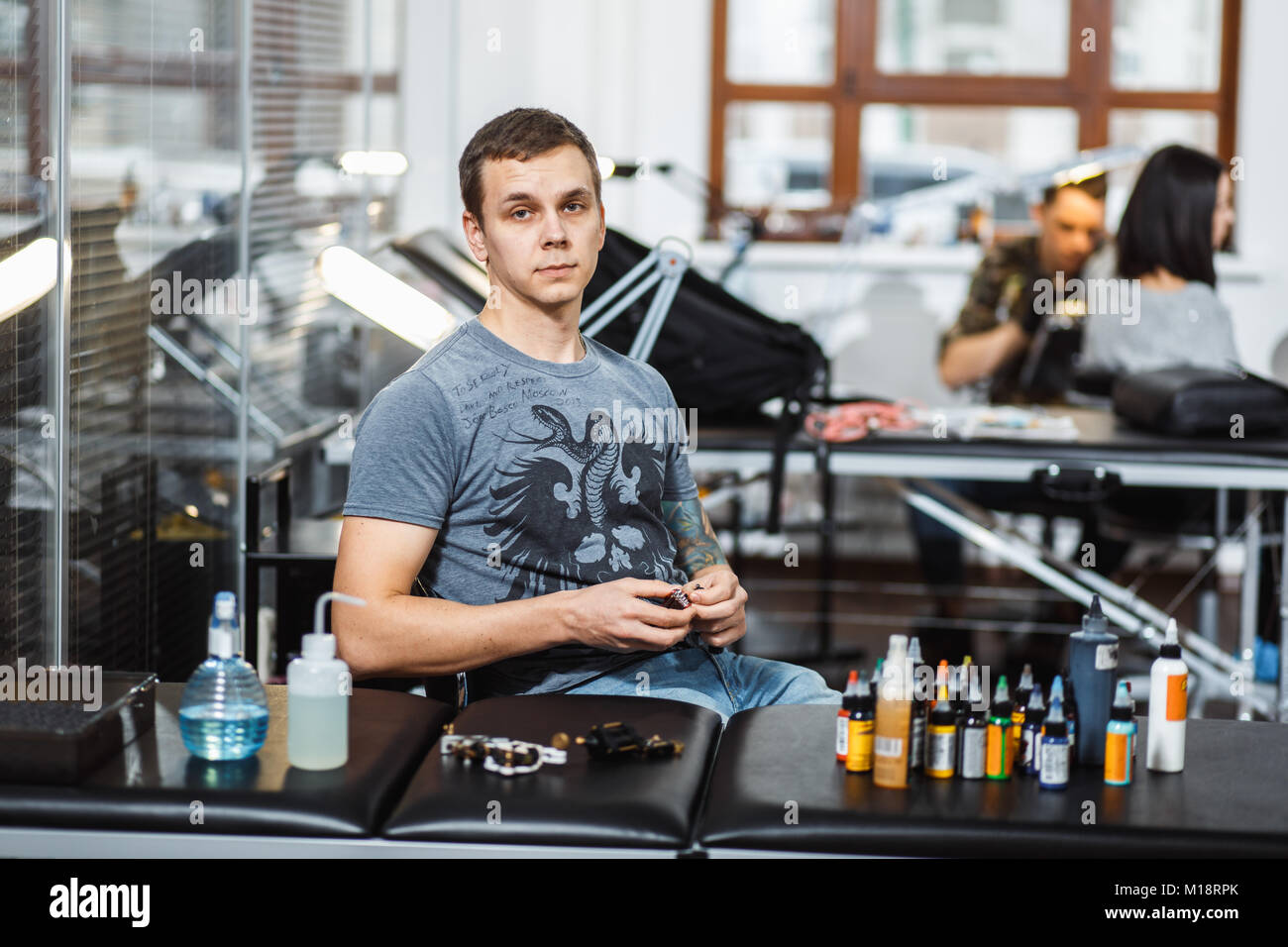Portrait of professional creative tattoo master Stock Photo - Alamy