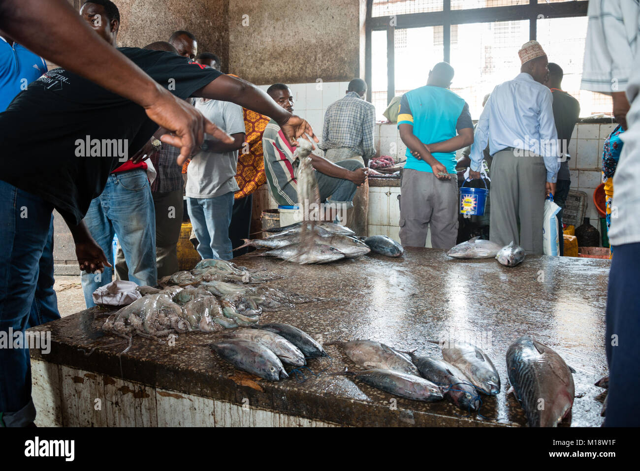 STONE TOWN, ZANZIBAR - JAN 4, 2018: Fish auction at Darajani Market in ...