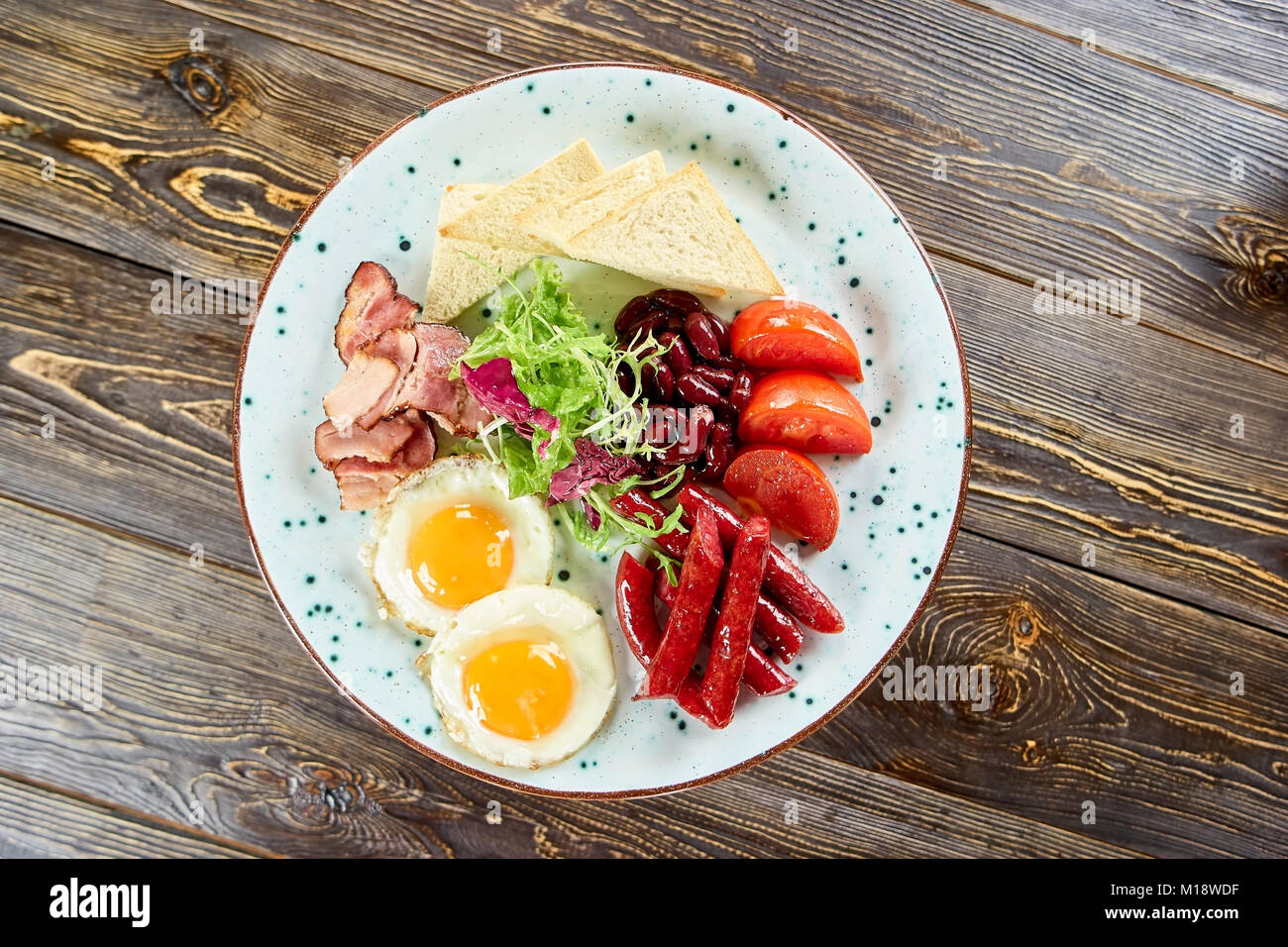 Fried juicy breakfast on plate Stock Photo - Alamy