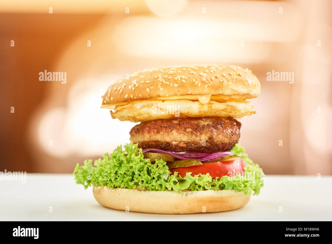 Big hamburger with many layers Stock Photo - Alamy