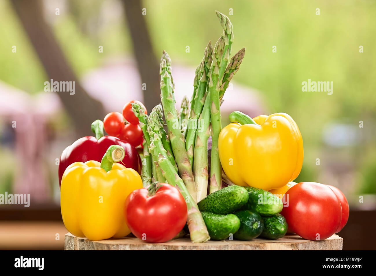 Shiny vegetables in blurred background Stock Photo - Alamy
