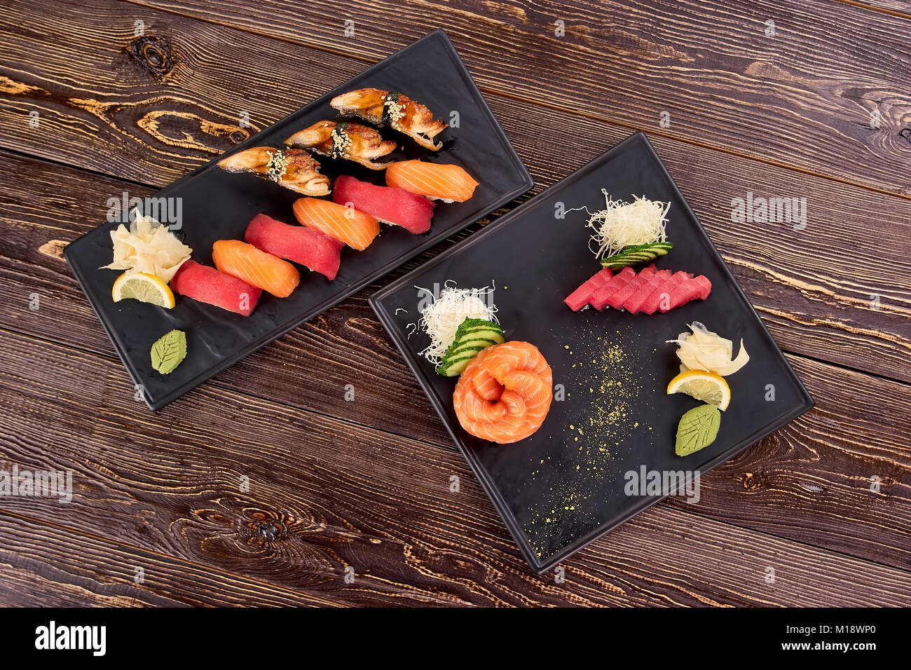 Two plates of nigiri sushi top view Stock Photo - Alamy