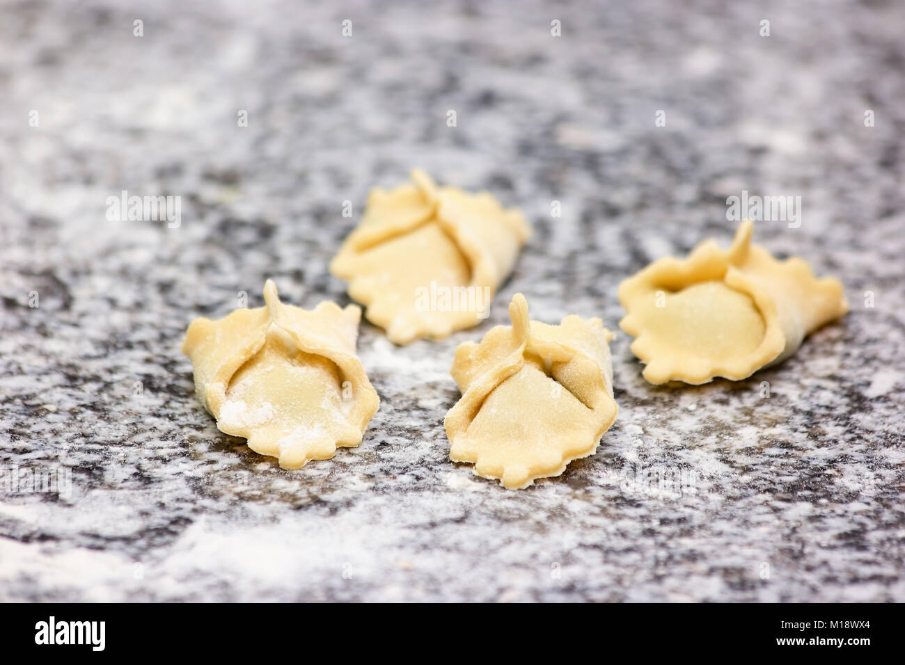 Uncooked ravioli ready for cooking Stock Photo - Alamy